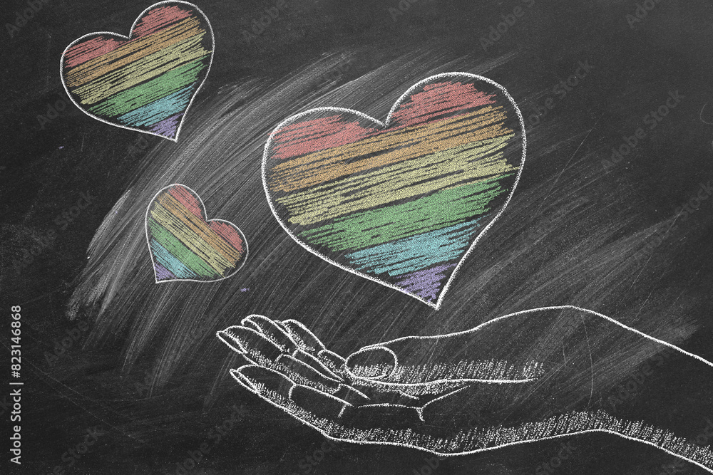 Woman's hand with rainbow hearts. LGBT, LGBTQIA rights and gender ...