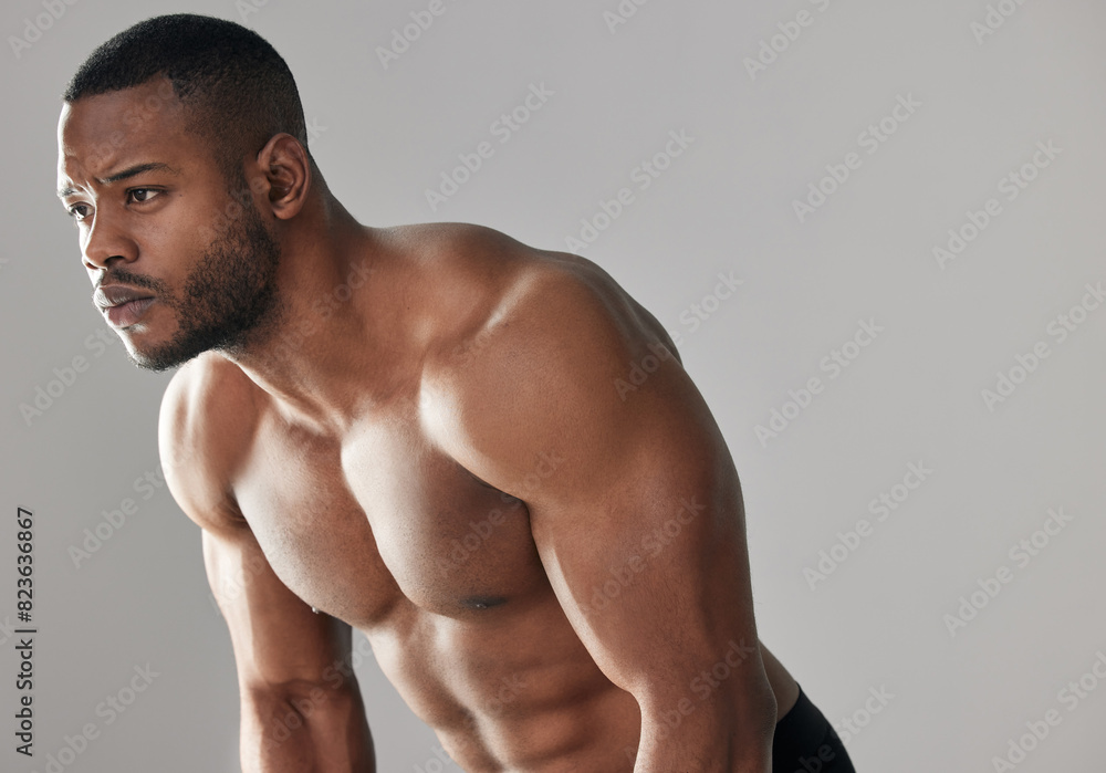 Thinking, muscle and black man in studio for fitness, exercise and body ...
