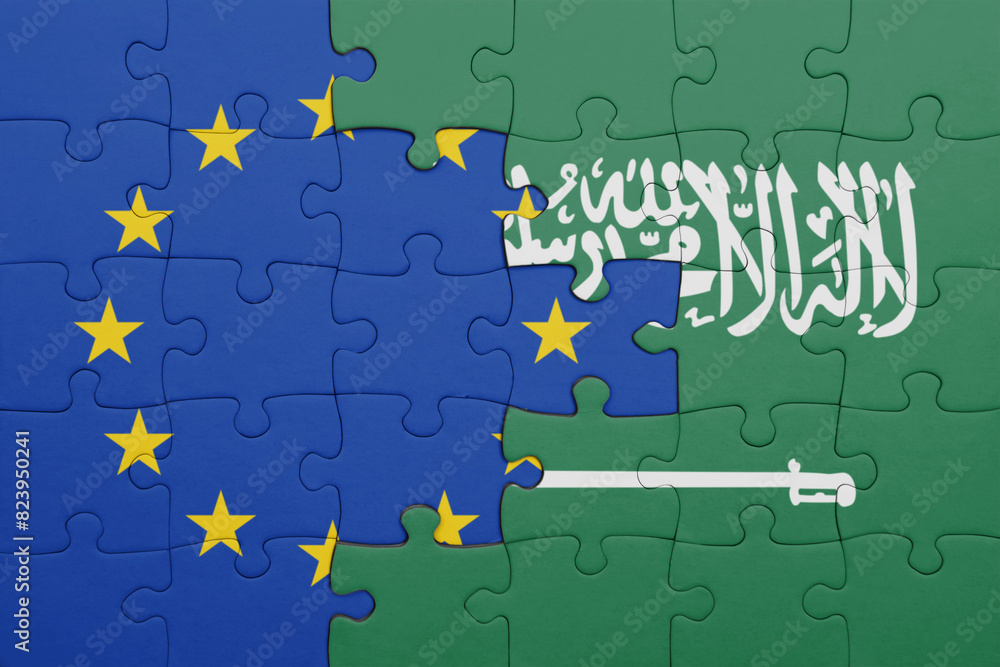 puzzle with the colourful national flag of saudi arabia and flag of ...