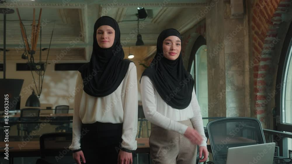 Two muslim islamic women in hijab strong businesswomen confident girls ...