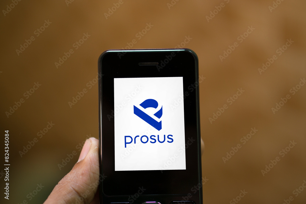 Dhaka, BD- 28 May 2024: Prosus logo is displayed on feature phone ...