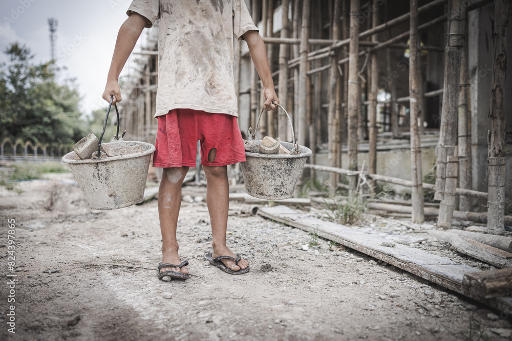 Poor children are forced to work in construction. Poor children ...
