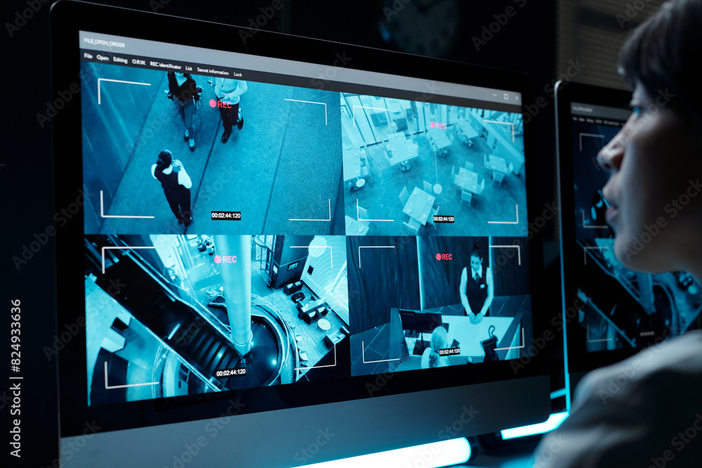 Screen of desktop computer with cctv video from every floor of modern ...