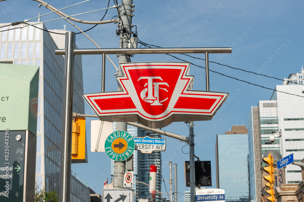 barrage of signs at the corner of University Avenue and College Street ...