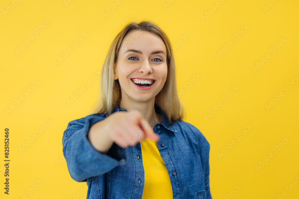 Its you. Beautiful young woman pointing finger at camera and smiling ...