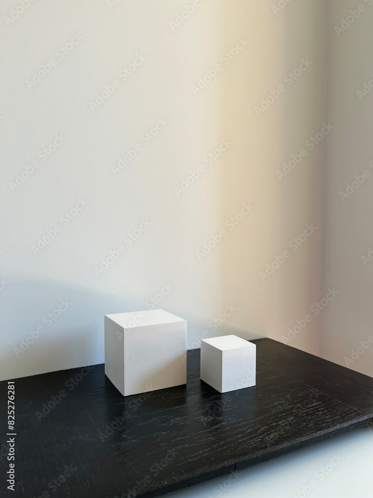 Display stand podium made from white concrete in two step display of ...