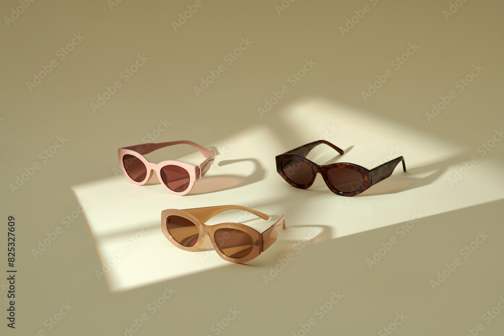 Stylish sunGlasses on a color background with sun shadow Stock Photo ...