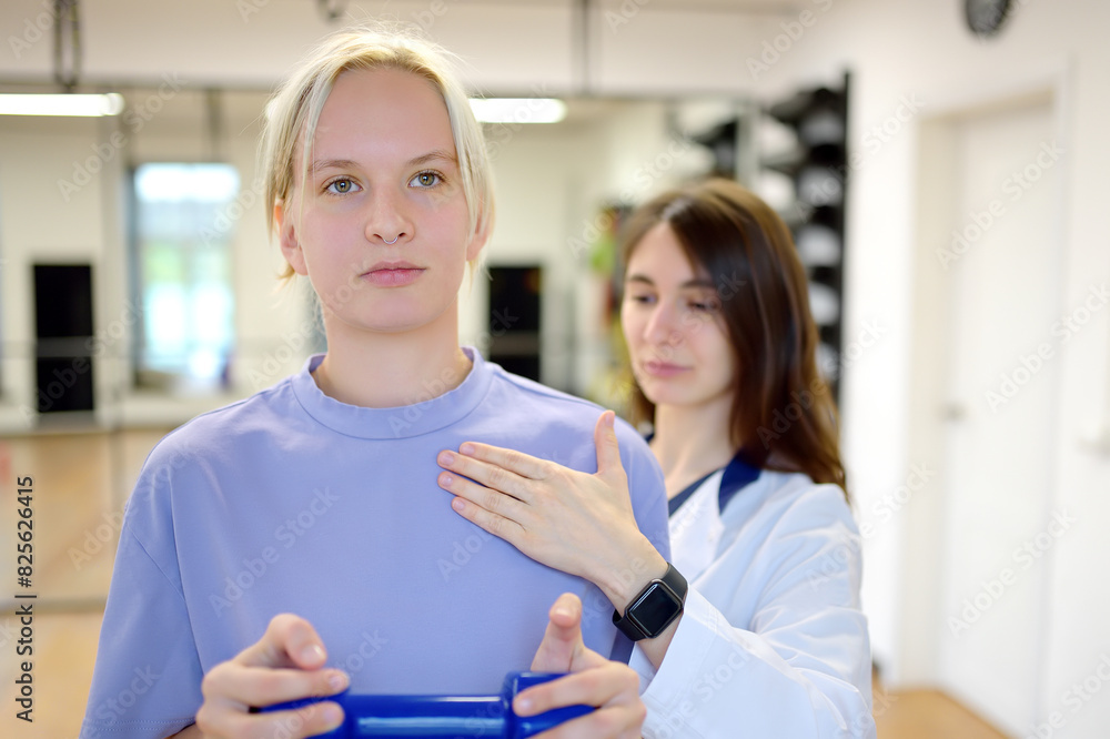 The rehab doctor conducts the patient's appointment in the gym. The PMR ...