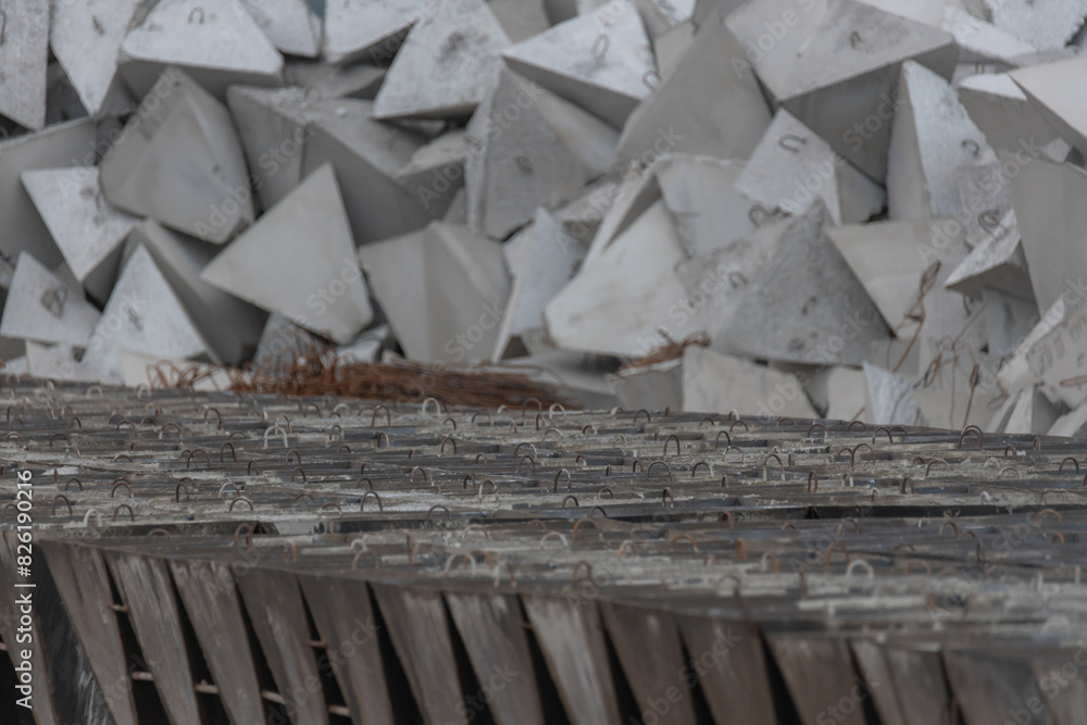 Making dragon teeth for defense. Concrete pyramids. Protection and trap ...