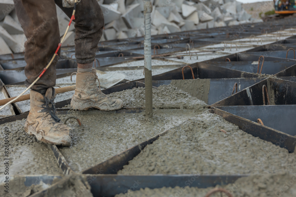 Making dragon teeth for defense. Concrete pyramids. Protection and trap ...