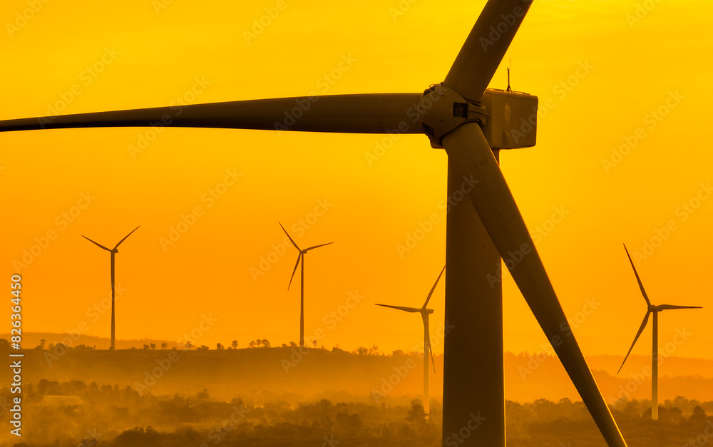 Wind farm field and sunset sky. Wind power. Sustainable, renewable ...