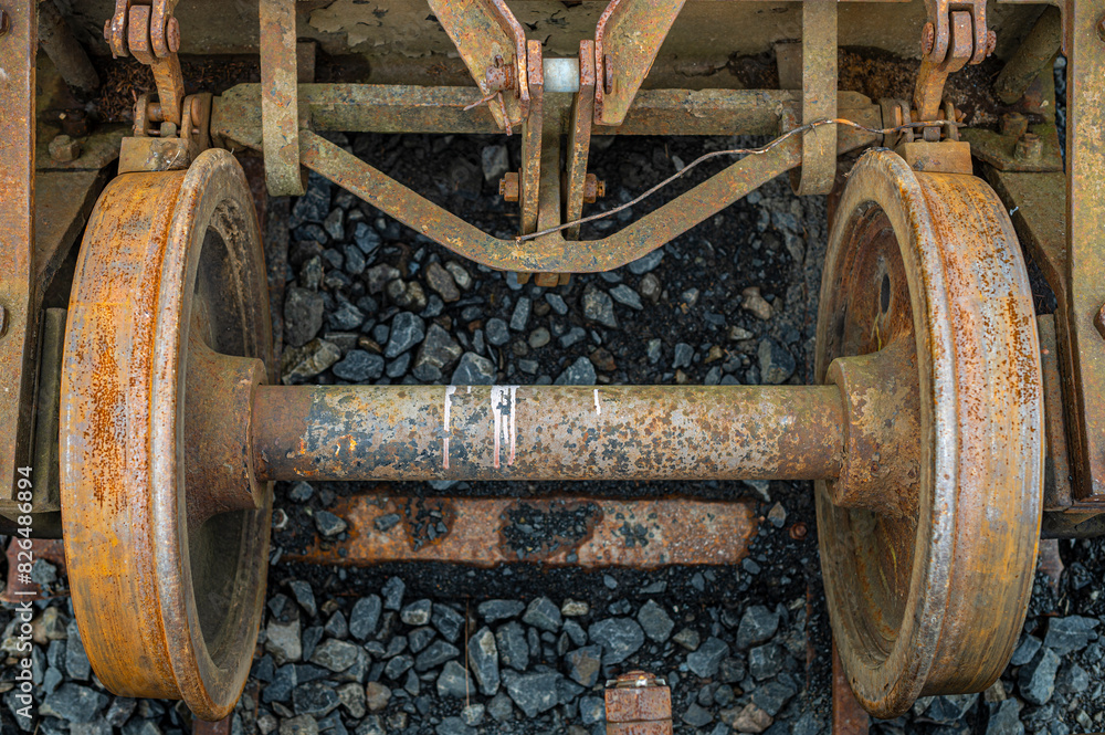 details of a train carriage chassis, with wheels, nuts, bolts and ...