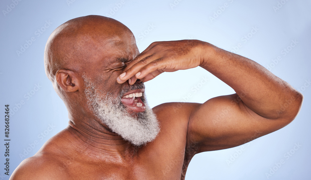 Disgusted, African man and holding nose in studio for body odour and ...