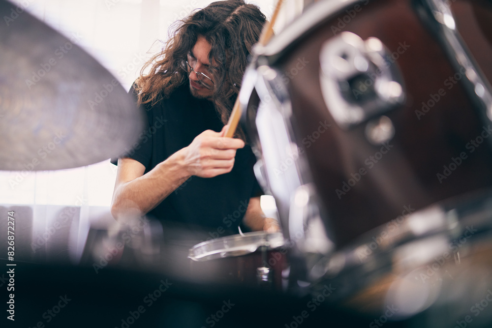 Man, drummer and artist in house with drums for band as musician in ...