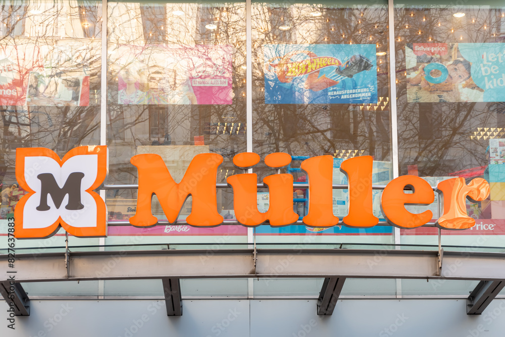 Müller store lettering and logo surrounded by European style ...