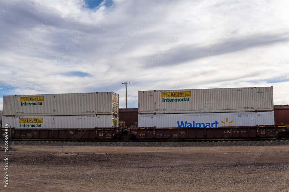 Winslow, AZ 86047, USA - 5 November 2022. Freight train with Walmart ...
