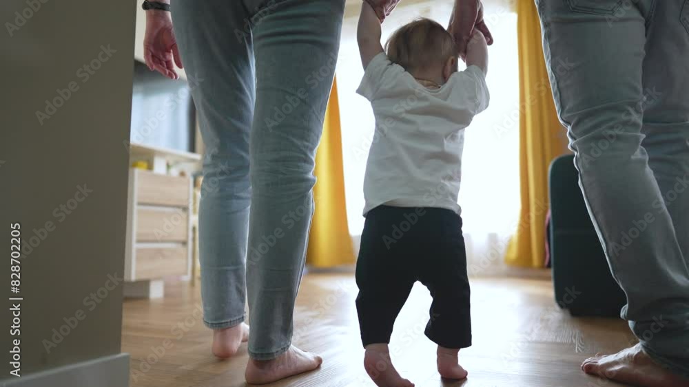 Happy family concept. walk around house. child takes its first steps ...