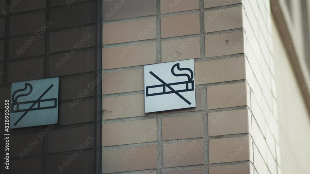 No Smoking Sign on a Brick Wall, indicating smoking restriction for ...