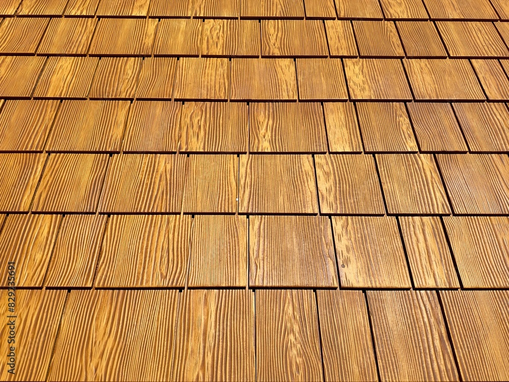 Cedar shingle siding offers a classic, rustic appearance, blending ...