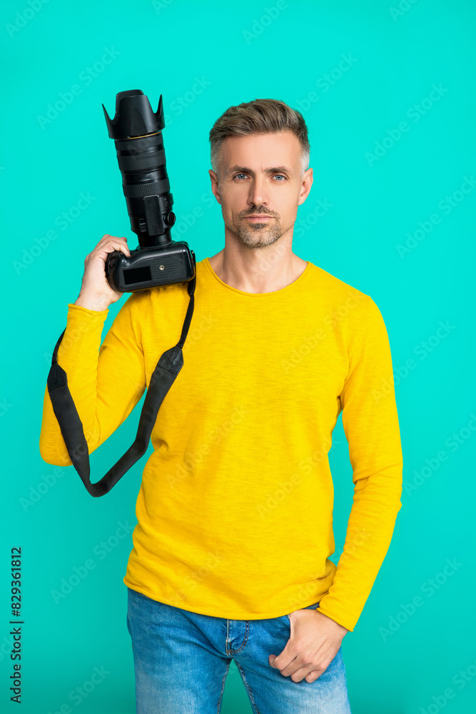 Professional photography. Shooting session. Photoshoot. Man taking ...