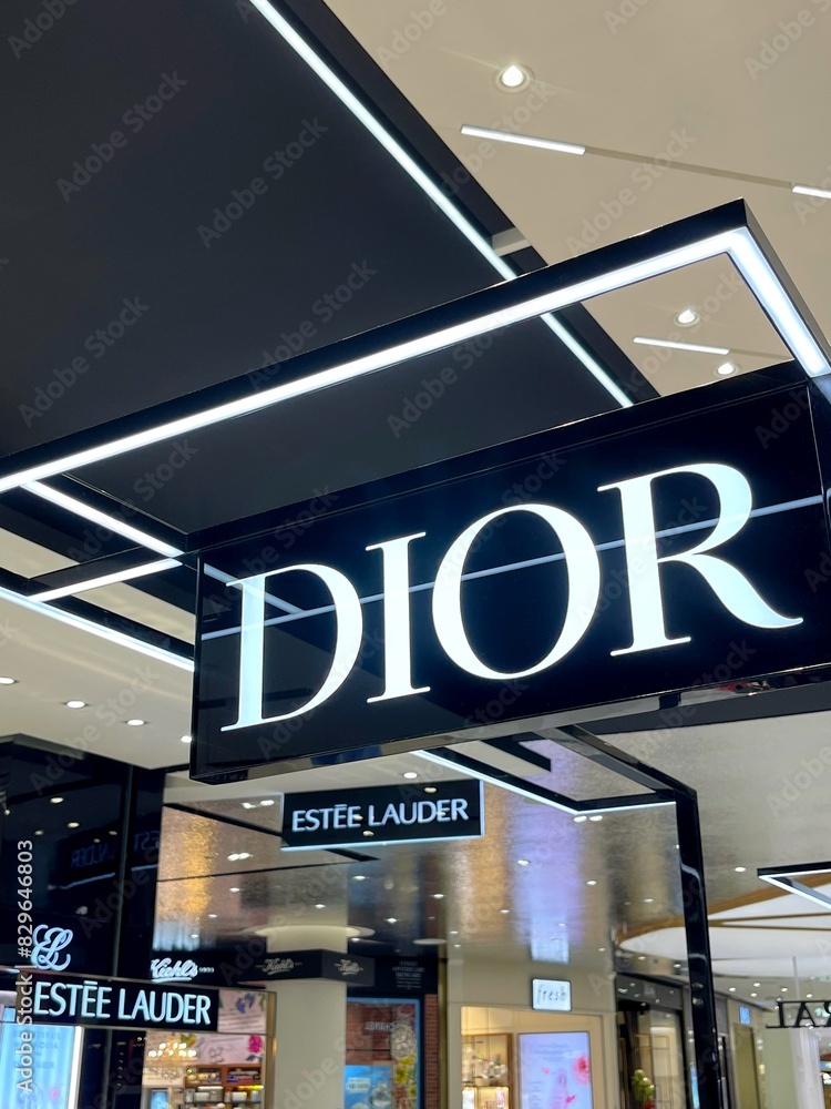 Brands Dior and Estée Lauder cosmetics in shopping center. Multi-brand ...