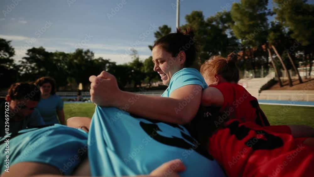 Women's Rugby Teams Engaged in a Scrum - Female rugby players in blue ...