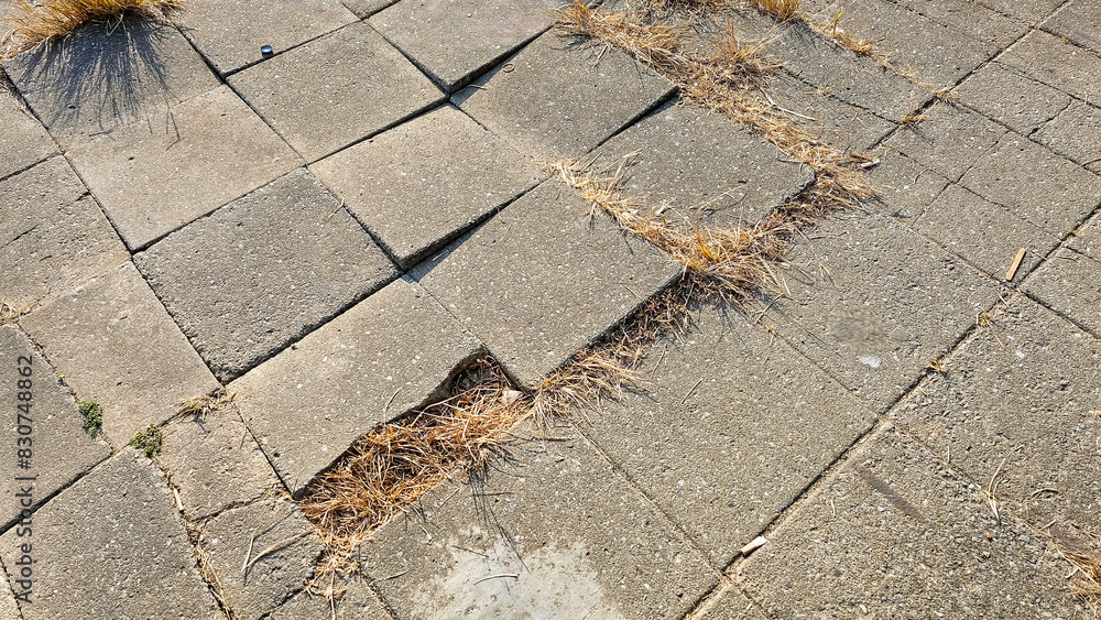 Cracked and broken sidewalk in Thailand. Broken slab on pedestrian road ...