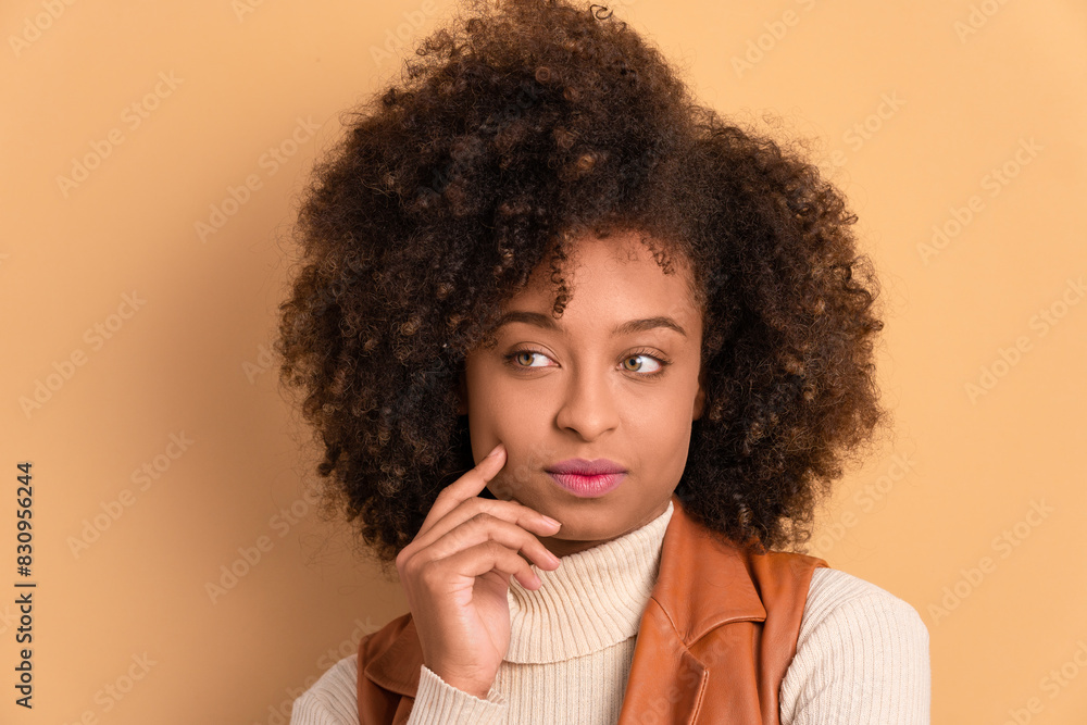 thoughtful african american woman thinking and looking to the side in ...