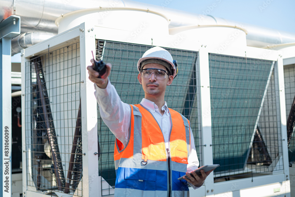 Engineer under checking the industry chilled water fan coil unit air ...