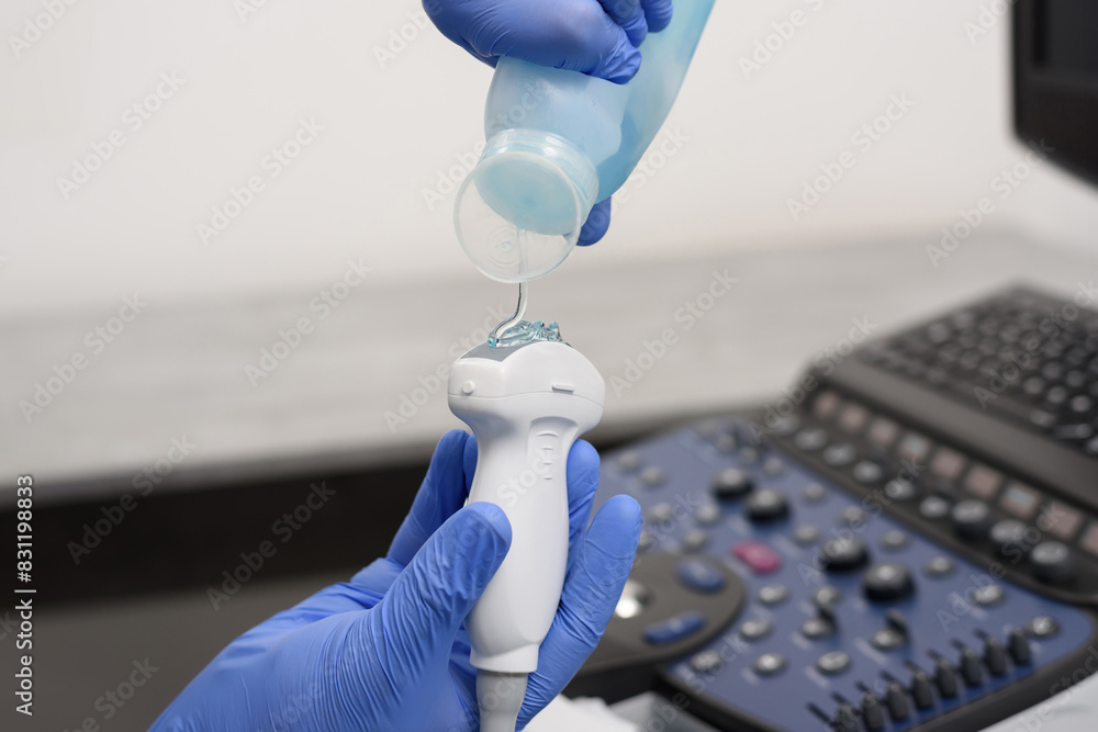 Foto de Probe for ultrasound diagnostics close-up. The doctor holds in ...