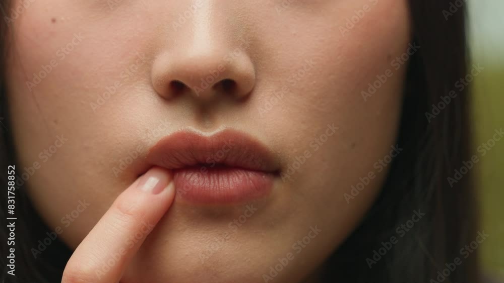 Extreme close up female lips chin pensive thoughtful unrecognizable ...