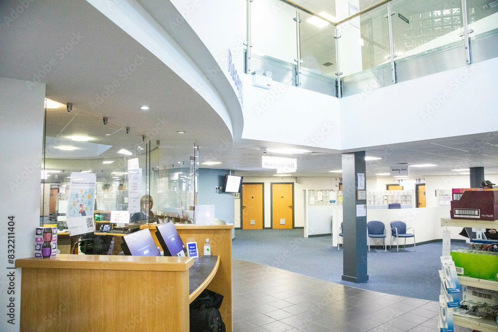 Reception area of a modern hospital with an information desk. Stock ...
