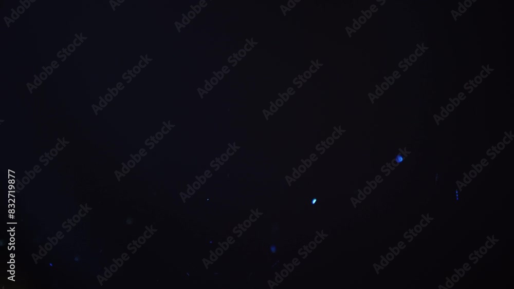 Dust particles are superimposed on floating shiny particles on an ...
