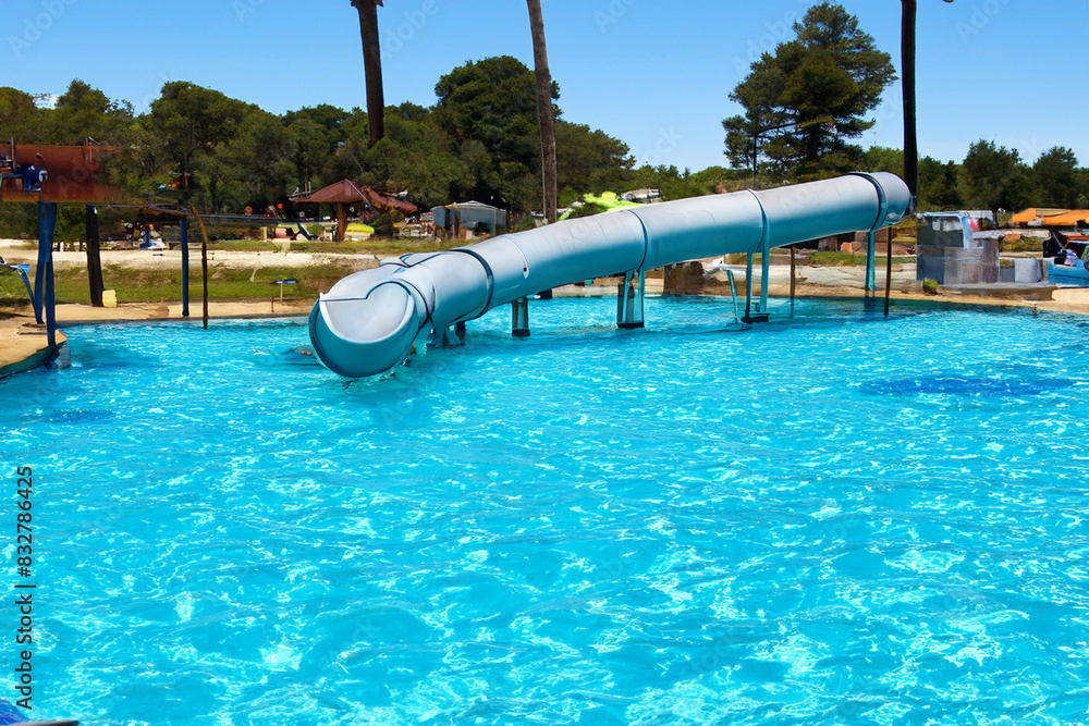 Water slides. Waterpark. Water park with water play areas, swimming ...