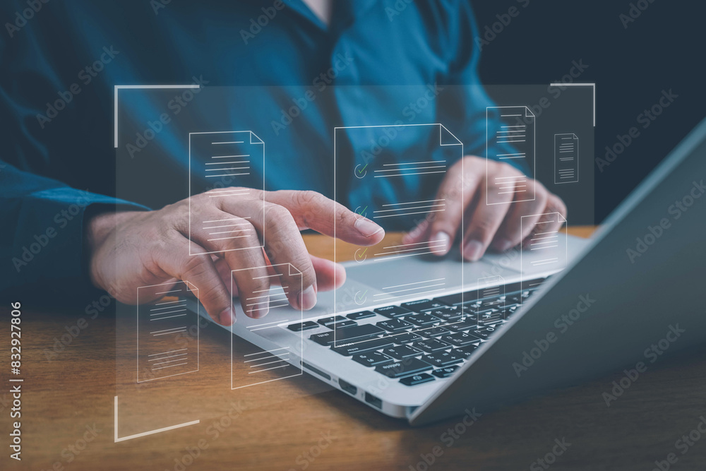 Document management system (DMS) technology, businessman use laptop ...