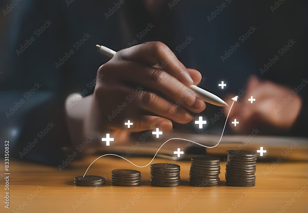 Interest rate and dividend concept, businessman use laptop with ...