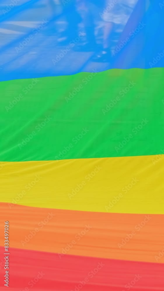 Big rainbow flag waving in slow motion during LGBT pride. Pride ...