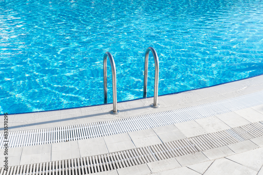 Swimming pool with stair and water. Swimming pool with handrail ...