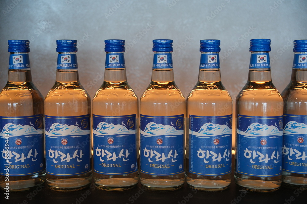 Jeju, South Korea-May 24th 2024: many bottles of Hallasan Soju. Korean ...