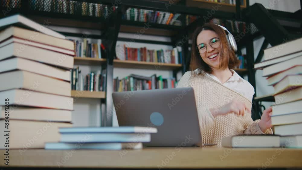 Young girl college student sit at desk use pc laptop computer watching ...