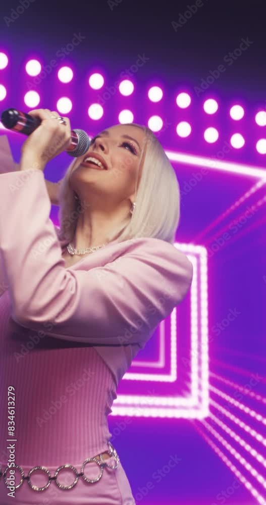 Vertical Screen: Fans Experiencing a Musical Performance by a Talented ...