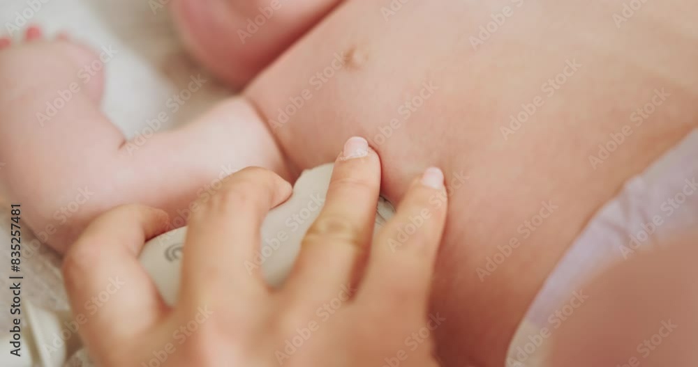 Pediatrician Conducting Abdominal Ultrasound on Newborn Baby. A ...