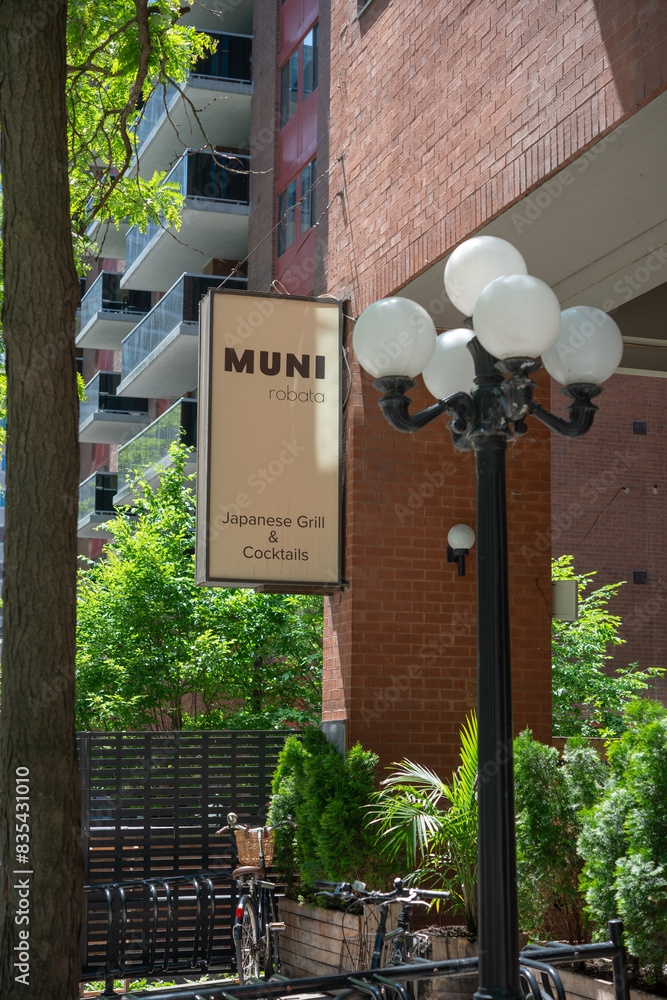 projecting sign outside Muni Robata, a Japanese restaurant, located at ...