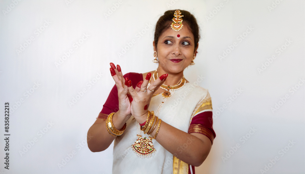Beautiful Indian classical dancer in traditional costume performing ...