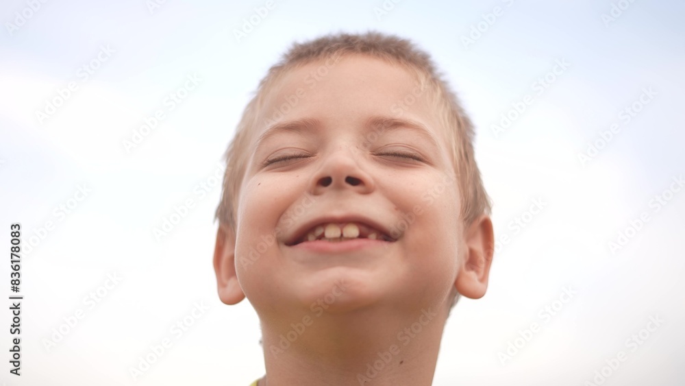 happy boy kid a child closed her eyes dream. child kid wants a dream ...