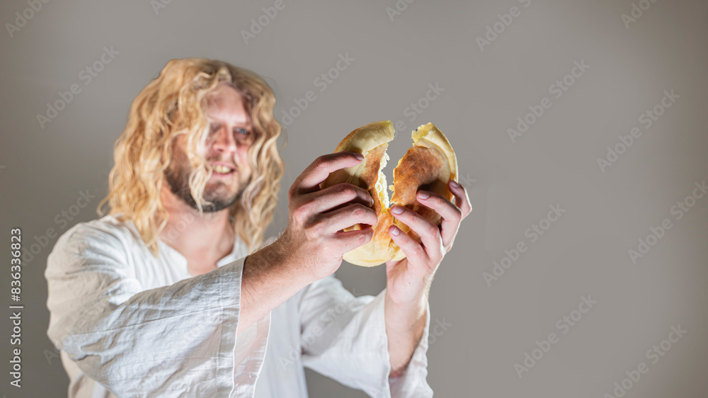 Jesus Christ breaking bread as a symbol of Communion Stock Photo ...