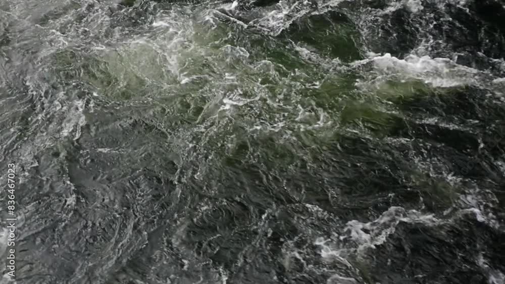 Cold and strong green water current representing the overloading of the ...