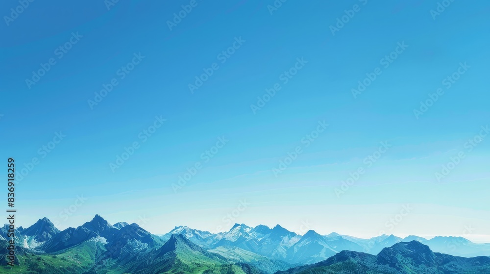 Majestic snow-capped mountain landscape with a crisp blue sky and ample ...