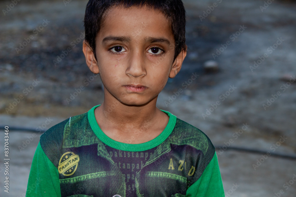 Sad boy in a refugee camp with sad face for lost family Stock Photo ...