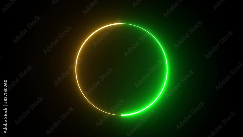 Round neon green and yellow frame against the black background of ...